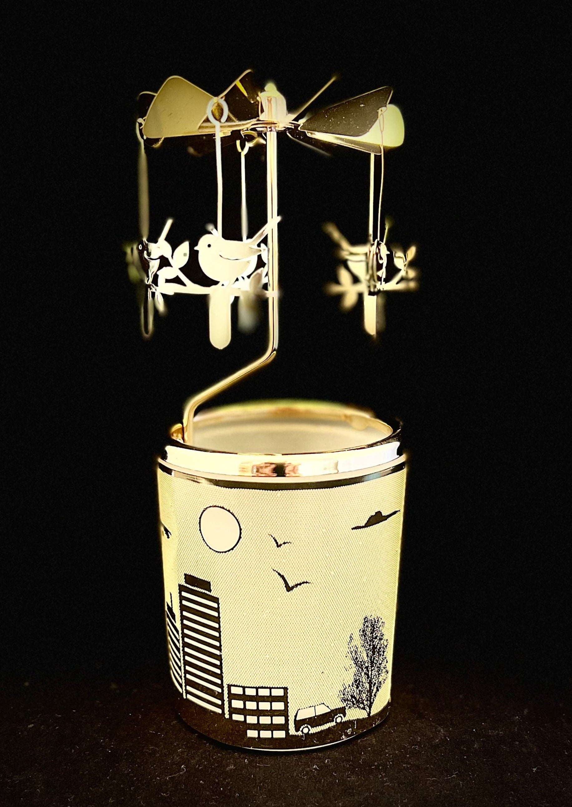 CANDLE CAROUSELS - Heat from flame makes it spin — Green Papaya